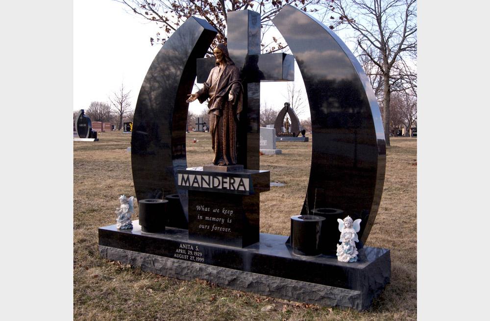 Large black granite monument with bronze Jesus statue – Krause Monument ...